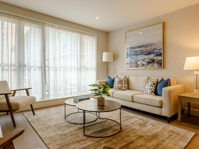 Interior Designed Waterfront Apartment With Skyline Views