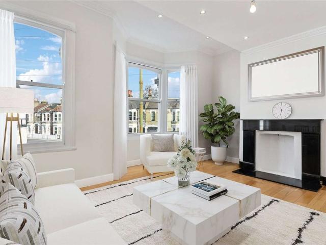 Introducing a lovely bright two bedroom split level flat ideally located on Dawes road