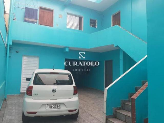 Investimento Inteligente: Sobrado composto por 3 casas mais salão comercial e lavanderia no bairro d