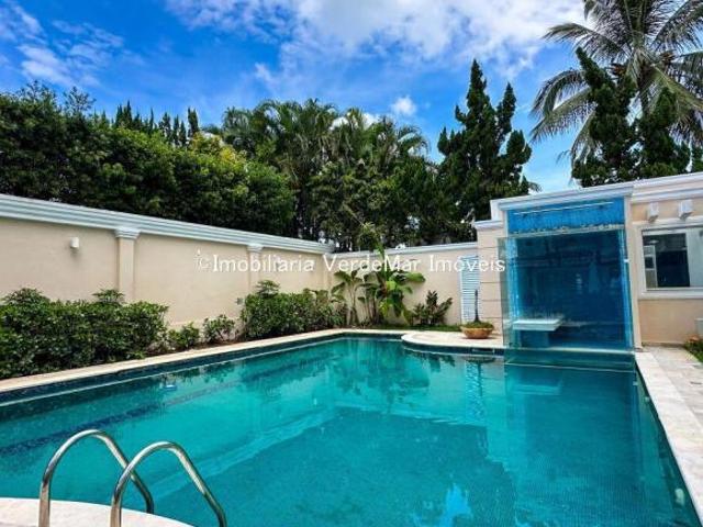 Jardim Acapulco Guarujá, casa com amplo espaço de lazer
