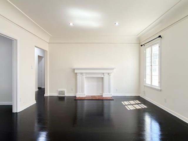Just Updated 1,100 Sq Ft 2 Bed / 1 Bath with Deco Fireplace + Garage Parking