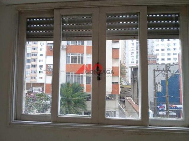 kit em bom estado, vista livre, segundo andar, prédio com elevador e garagem