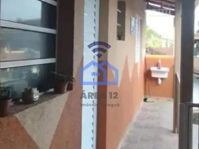 Kitnet em condomínio à venda a apenas 300m da praia no bairro do Massaguaçu em Caraguatatuba, SP