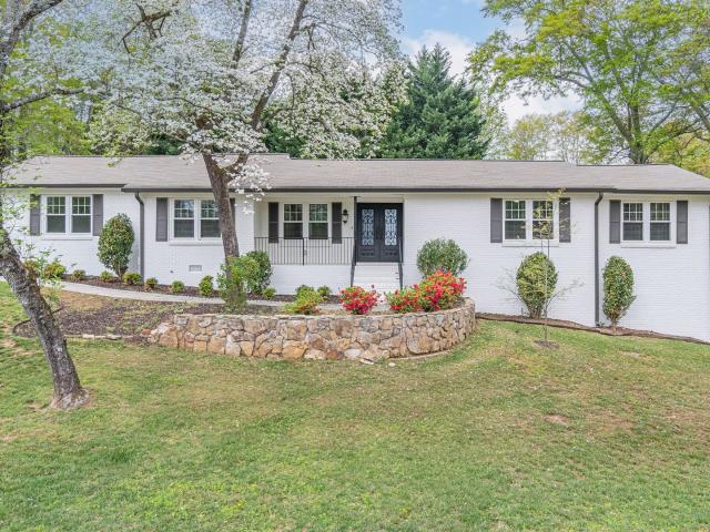 Large 3 bedroom 3 bath two story ranch home within walking distance to downtown Woodstock