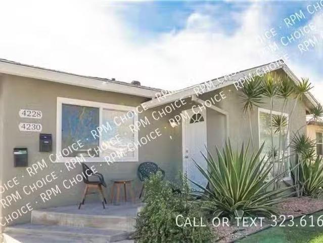 Large 3bd/1ba Duplex 1200sq with front and back yard and long.