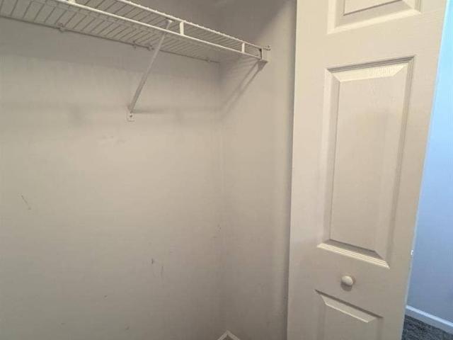 Large Bedroom Shared Bath/Laundry