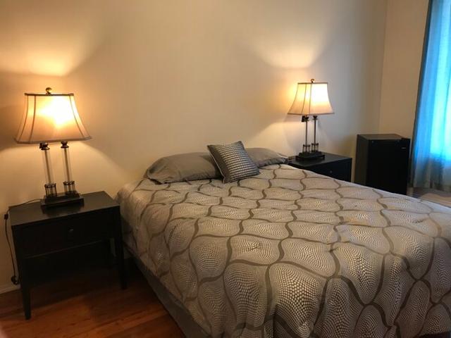 Large bedroom w/ private Refrigerator + Closet + Utilities included