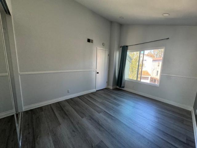 Large Bedroom with Shared Bathroom with female