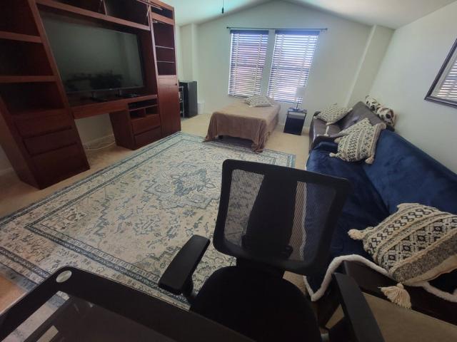 Large furnished room and full bathroom for rent