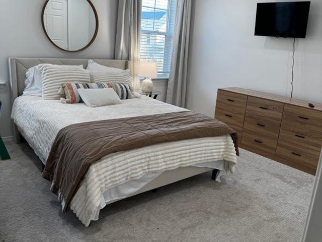 Large, luxurious bedroom in an excellent