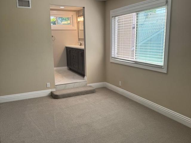 Large main bedroom with private bathroom male