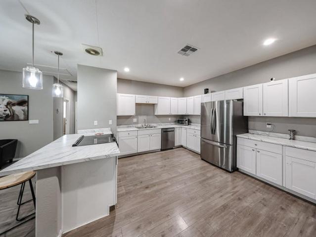 Large Modern Phoenix Home with Work Space in each