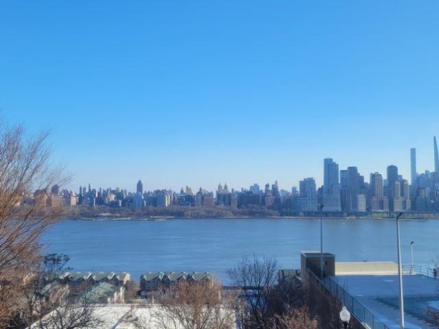 Large room in new apartment with NYC skyline view
