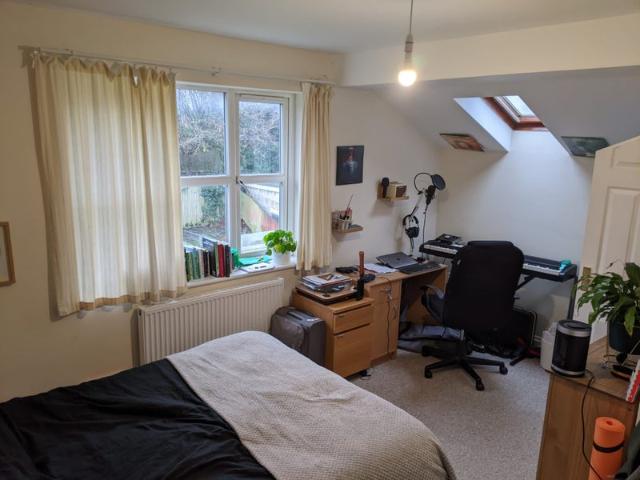 Large sunny bedroom with en suite bathroom