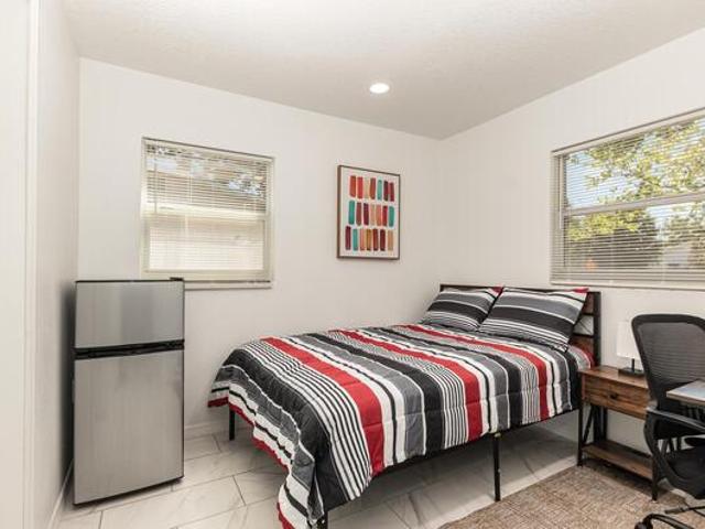 LAST ROOM available at a HIGH RATED HOUSE Modern CoLiving near Universal, Kirkman Rd | Personal Mini Fridge in all rooms | Managed by a Top Rated Host | All Utilities Including High Speed Wi Fi | On Site Laundry