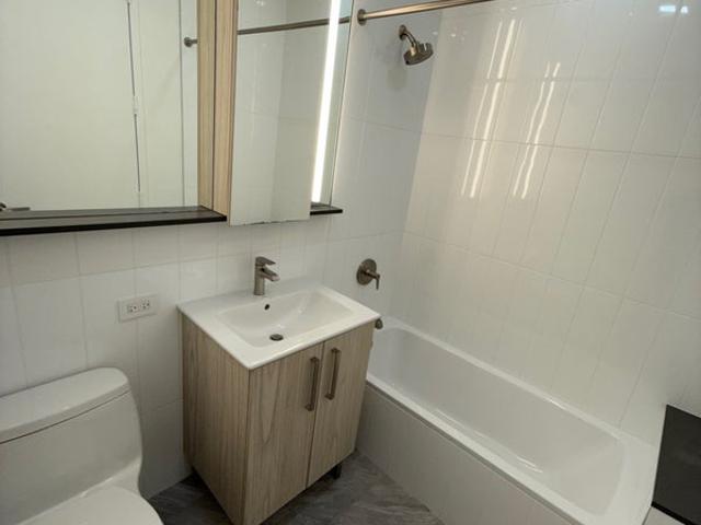 Last roommate needed in Luxury Midtown Building