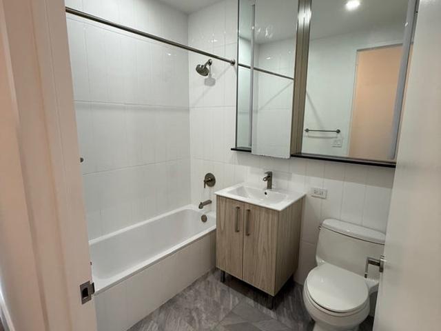 Last roommate needed in Luxury Midtown Building