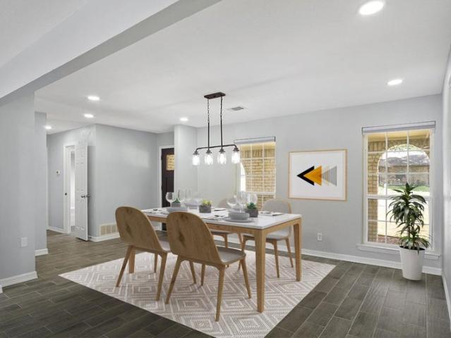 Lavishly remodeled Plano home with fenced yard & p