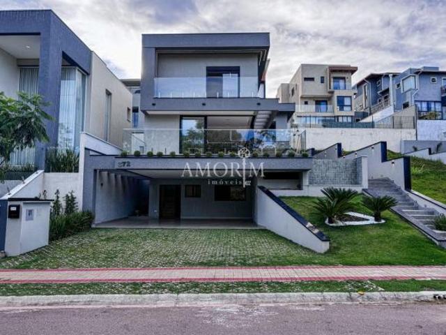 Linda casa a venda 4 suítes piscina 4 vagas Condomínio Itahye Santana de Parnaíba
