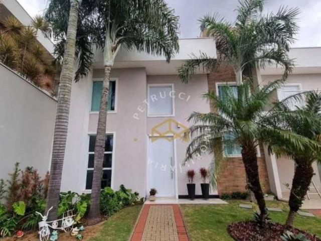 LINDA CASA À VENDA COM PISCINA E UM BELO JARDIM NA ENTRADA RESIDENCIAL MARIA DULCE EM INDAIATUB