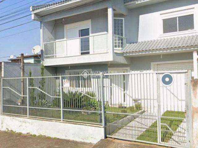 Linda casa bem localizada em Gravataí
