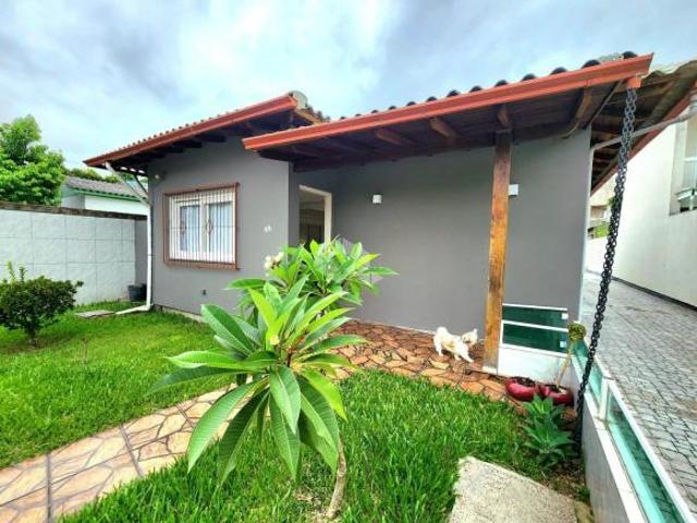 Linda casa com 3 dormitórios no centro de Eldorado do Sul por R$750.000,00