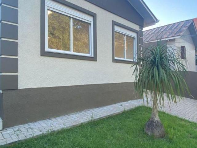 Linda casa com 3 dormitórios à venda, 100 m² por R$ 489.000 COHAB Cachoeirinha/RS