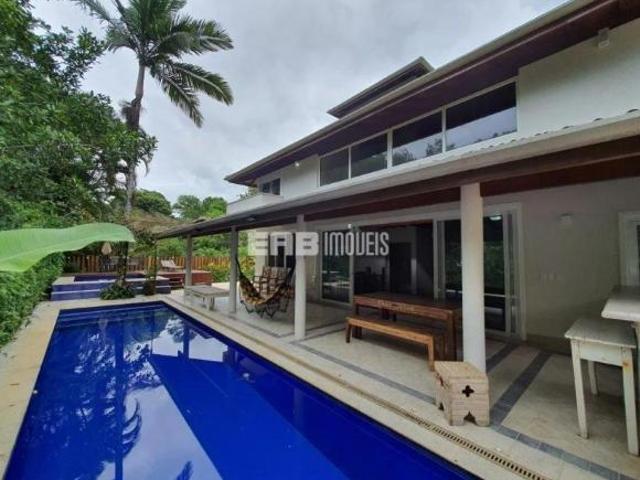 Linda casa com piscina e espaço gourmet à venda em Itamambuca