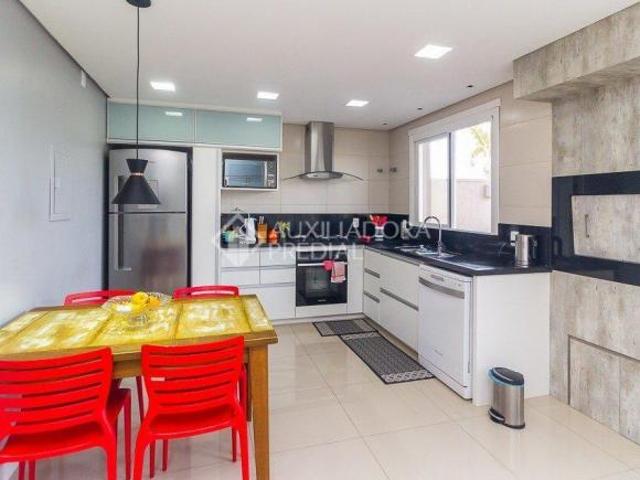 Linda casa em condomínio com 3 quartos sendo 1 suíteno bairro Jardim Isabel
