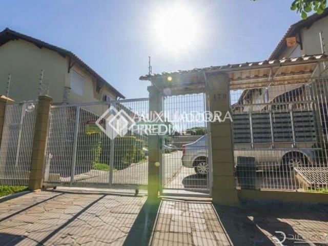 Linda Casa em condomínio á venda de 02 Dormitórios