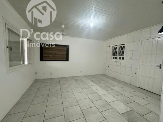 Linda casa em condomínio, à venda no bairro Novo Mundo Gravataí/RS