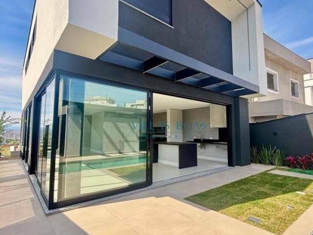 Linda casa em condomínio de alto padrão com 4 suítes!
