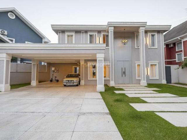 LINDA CASA EM CONDOMÍNIO FECHADO 4 SUÍTES E PISCINA