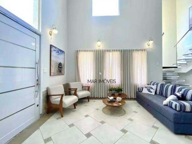 Linda casa em excelente localização dentro de condomínio fechado de alto padrão na região da praia d