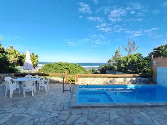 Linda casa em estilo mediterrâneo pé na areia