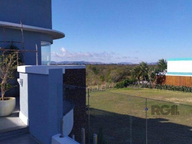 Linda casa para Comprar, mobiliada,com 3 suítes no Condomínio Ponta da Figueira