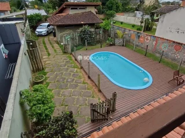 Linda casa rústica com piscina e área gourmet