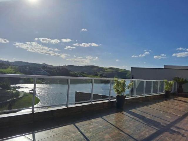 LINDA CHÁCARA, PÉ NA AGUA E VISTA PANORAMICA PARA A REPRESA, NO CONDOMÍNIO PARAISO DE IGARATA EM I
