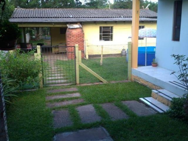 lindo terreno com 2 casas em ótima localização