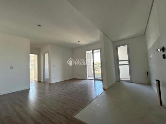 Lindo apartamento, 2 quartos, suíte, amplo living c/ sacada e churrasqueira e 2 vagas de garagem