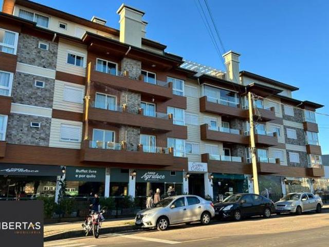 Lindo Apto mobiliado 2 dorm suíte box duplo na rua coberta no coração de Canela