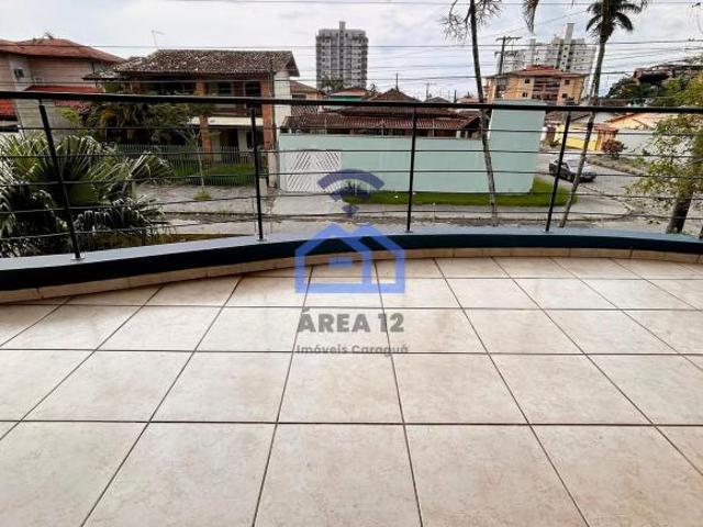 Lindo e amplo sobrado com 04 dormitórios à Venda no bairro do Indaiá a poucas quadras da praia em Ca