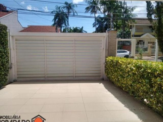 Lindo sobrado na zona 02 Terreno 600m2 Construção 546m2 4 Suítes sendo: 1 suíte master com closet