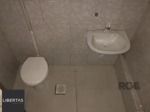Libertas Imobiliária aluga loja comercial com 55m² no bairro Passo D'Areia