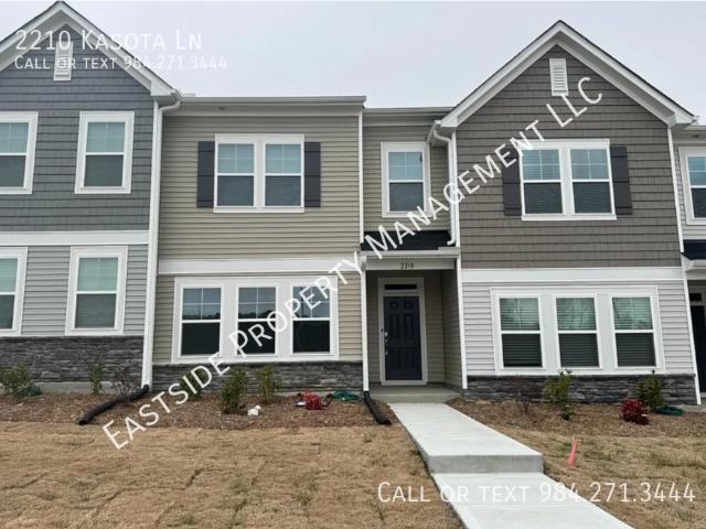 Like new, beautifully finished townhouse in a highly sought after Raleigh location! Rear end car garage!