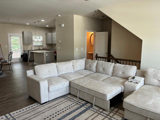 Like new, low maintenance 4 Bedroom / 3.5 Bath Buford townhouse in gated community Chatham Village. New flooring greets you immediately upon entering and flows throughout the home.