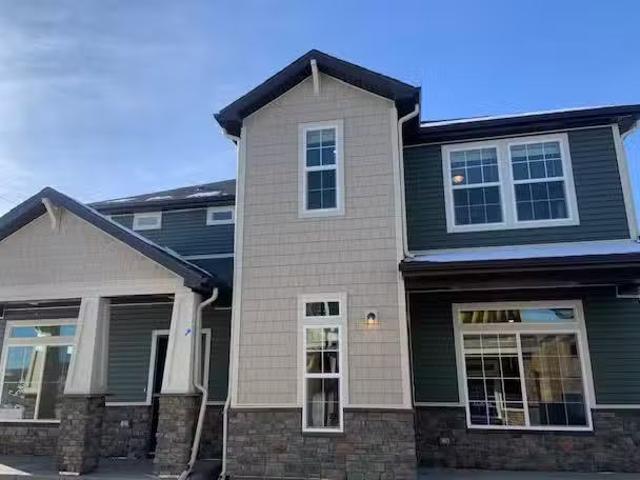LIKE NEWConstruction Townhome! 17754 E 103rd Ave