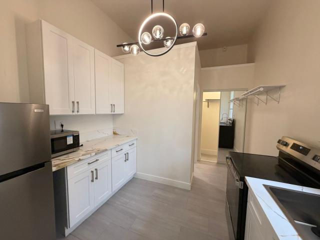 Live Downtown! Newly Updated Historic Studio Available Now