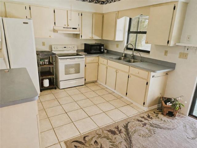 Live in a quiet Port Charlotte neighborhood, less
