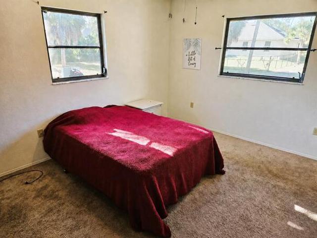 Live in a quiet Port Charlotte neighborhood, less than a 10 minute drive from Charlotte Sports Park